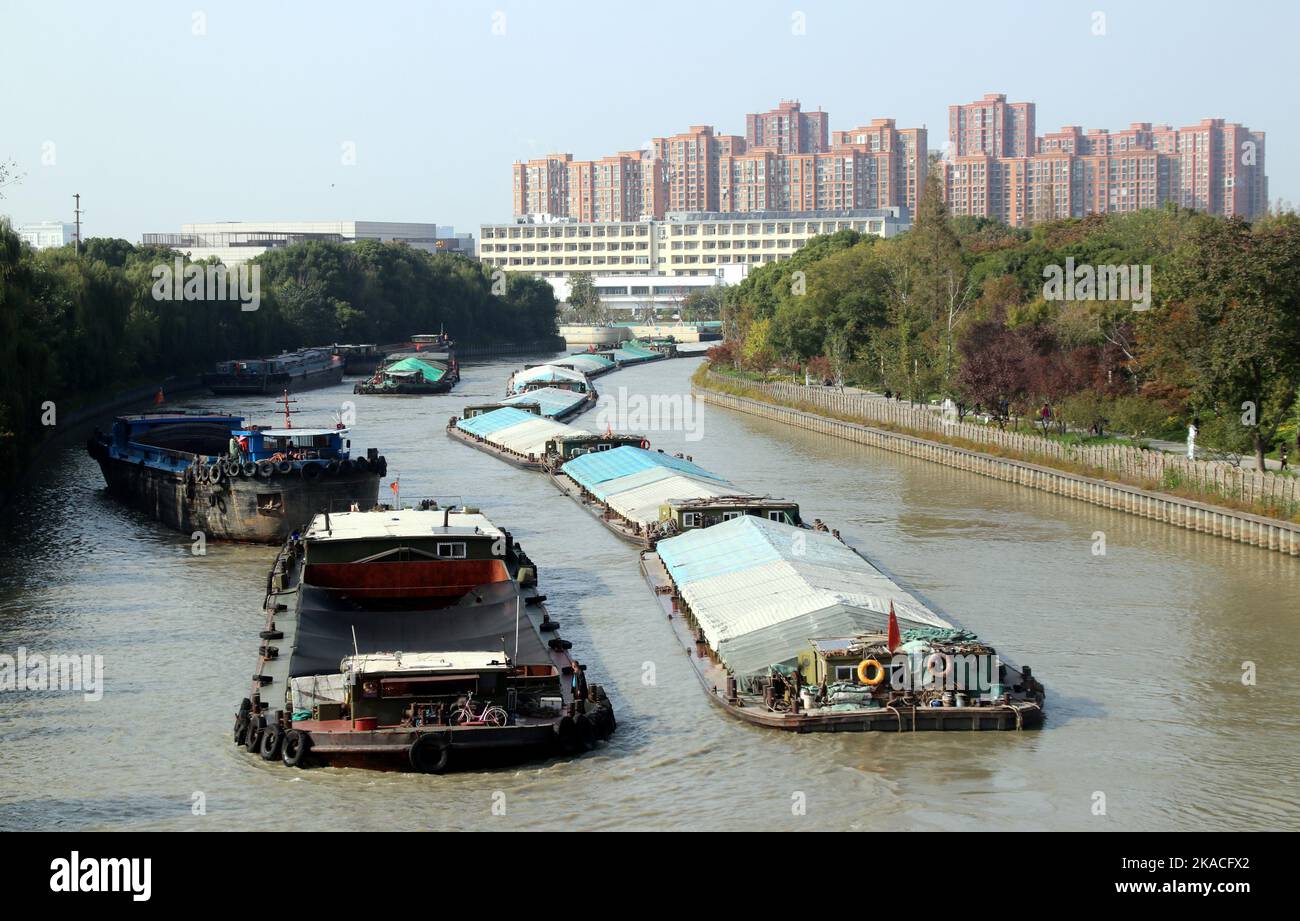 Ships shuttle on the Beijing-Hangzhou Grand Canal, also known as "the ...