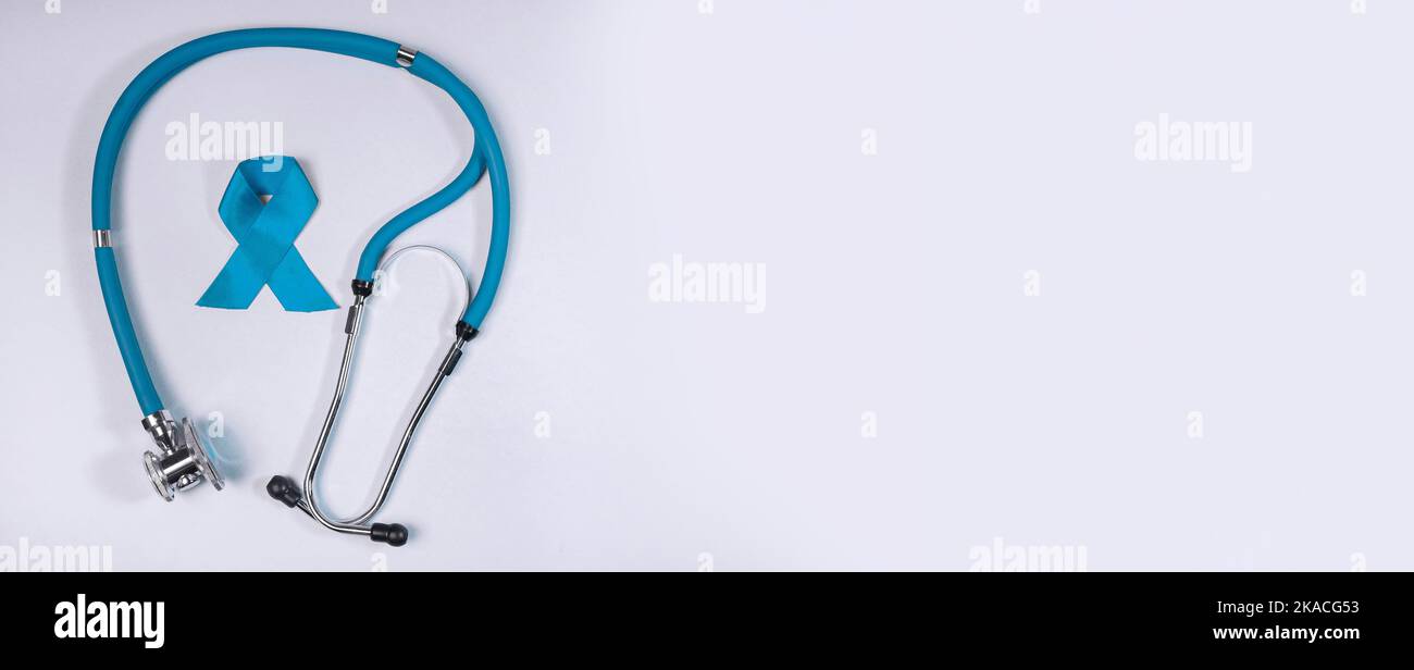 Blue stethoscope and ribbon bow for male health awareness, prostate ...