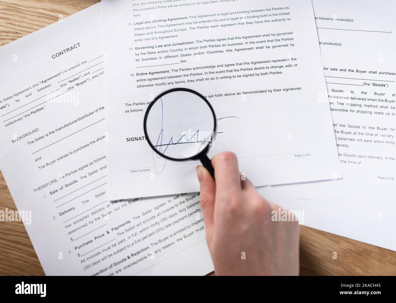 Contract signature verifying through magnifying glass. Concept of sign ...