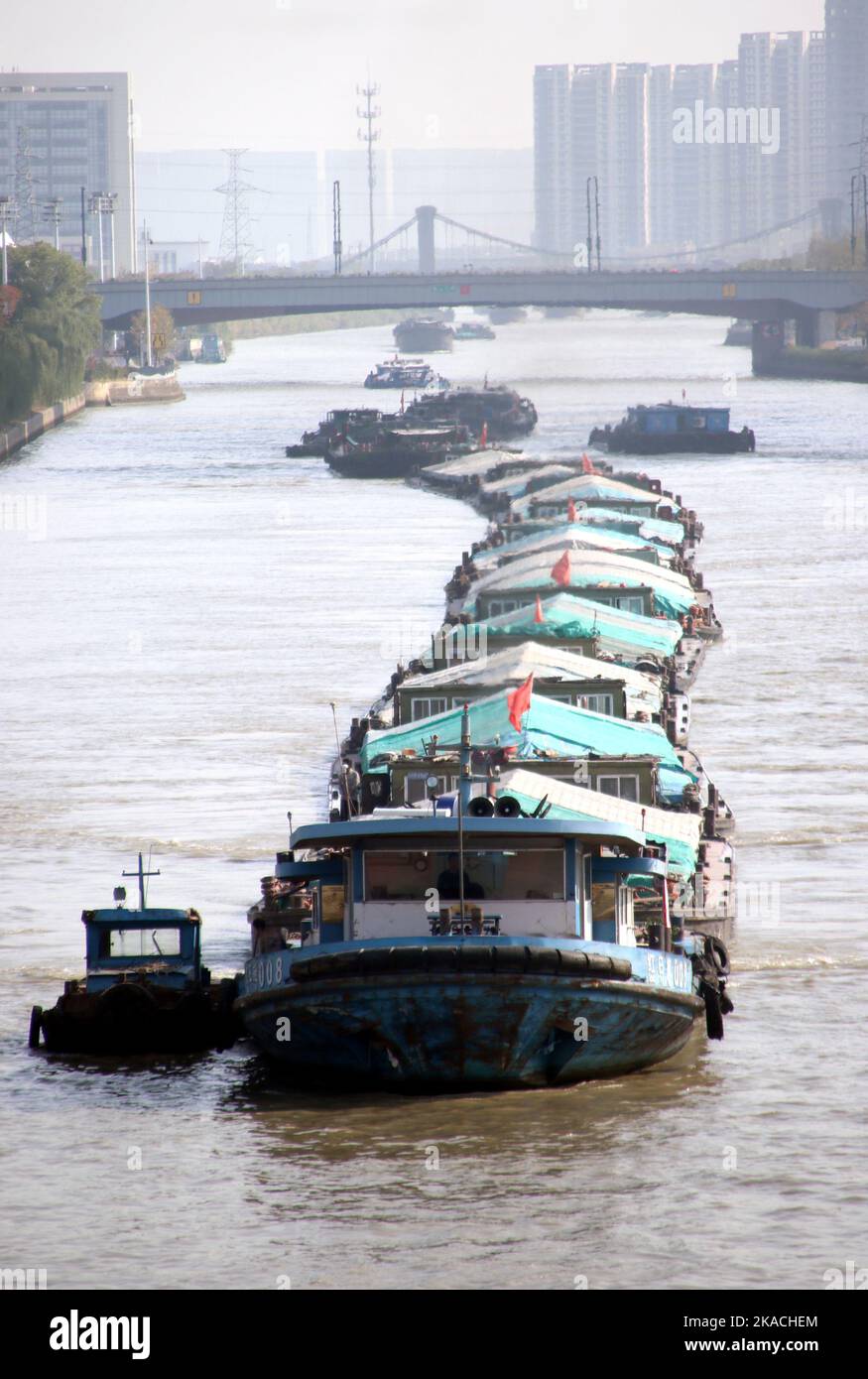 Ships shuttle on the Beijing-Hangzhou Grand Canal, also known as "the ...