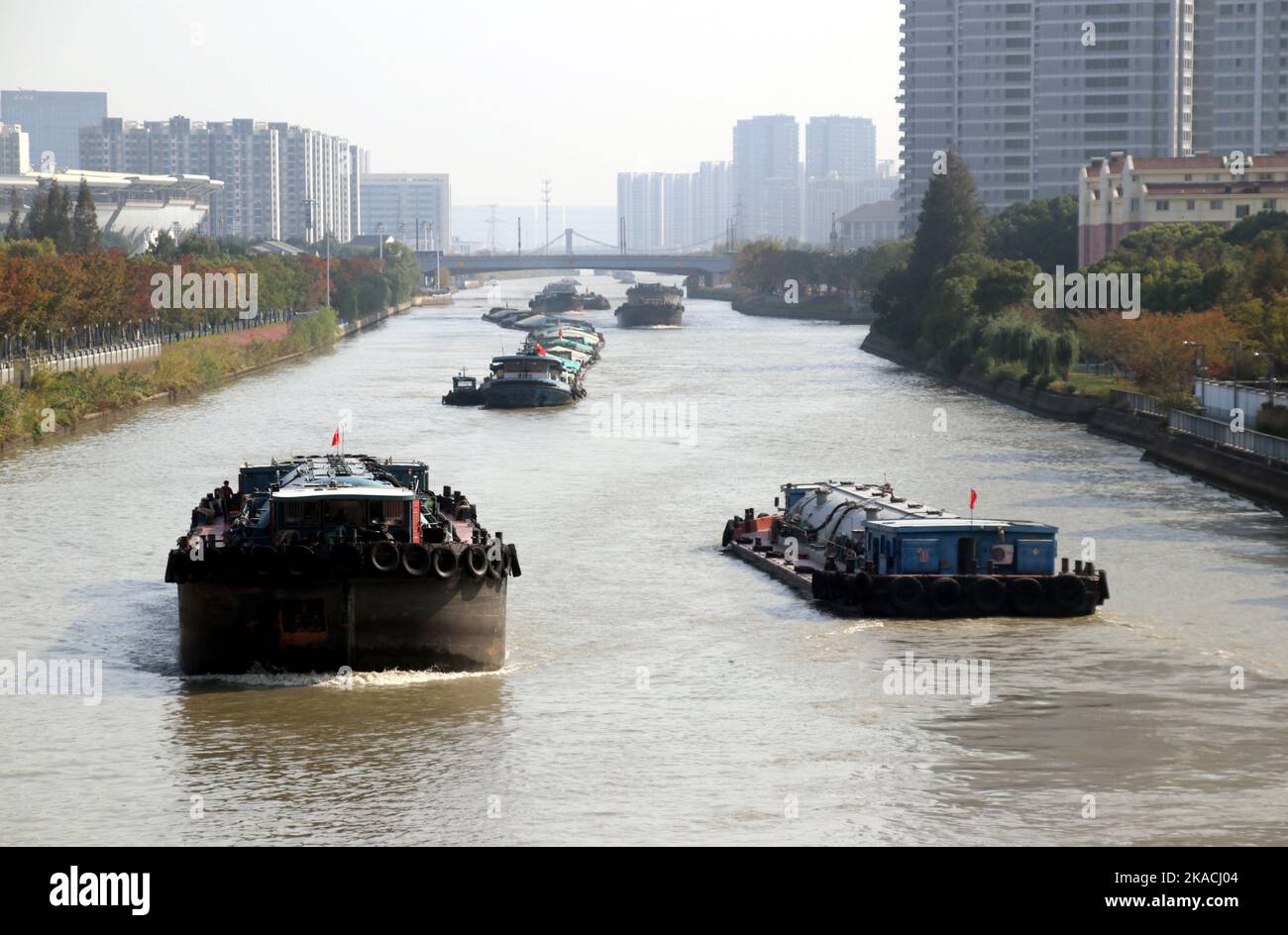 Ships shuttle on the Beijing-Hangzhou Grand Canal, also known as "the ...