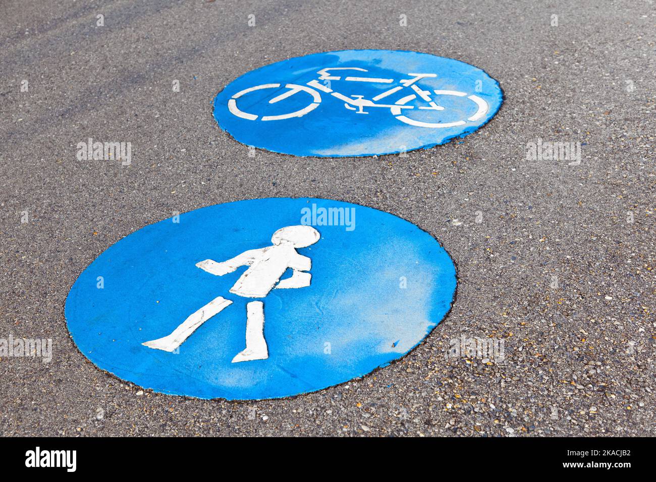 symbol for path and bikelane on asphalt Stock Photo - Alamy
