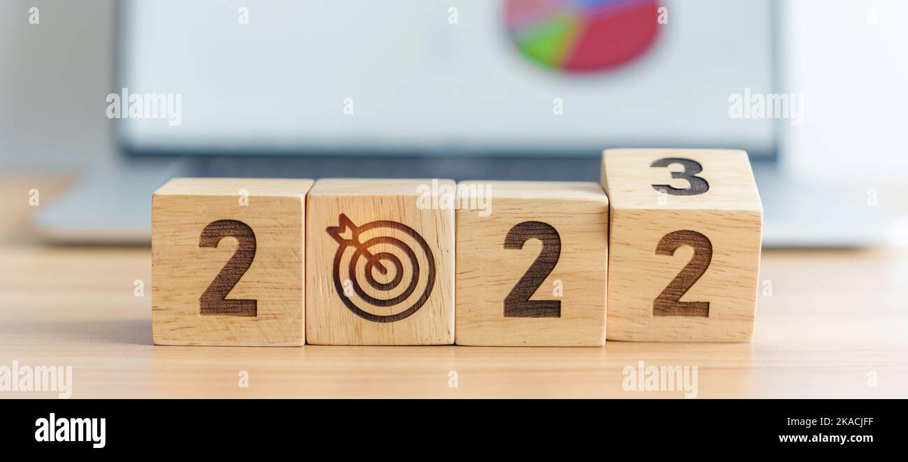 2023 Year block with dartboard icon against computer laptop background. Goal, Target, Resolution ...
