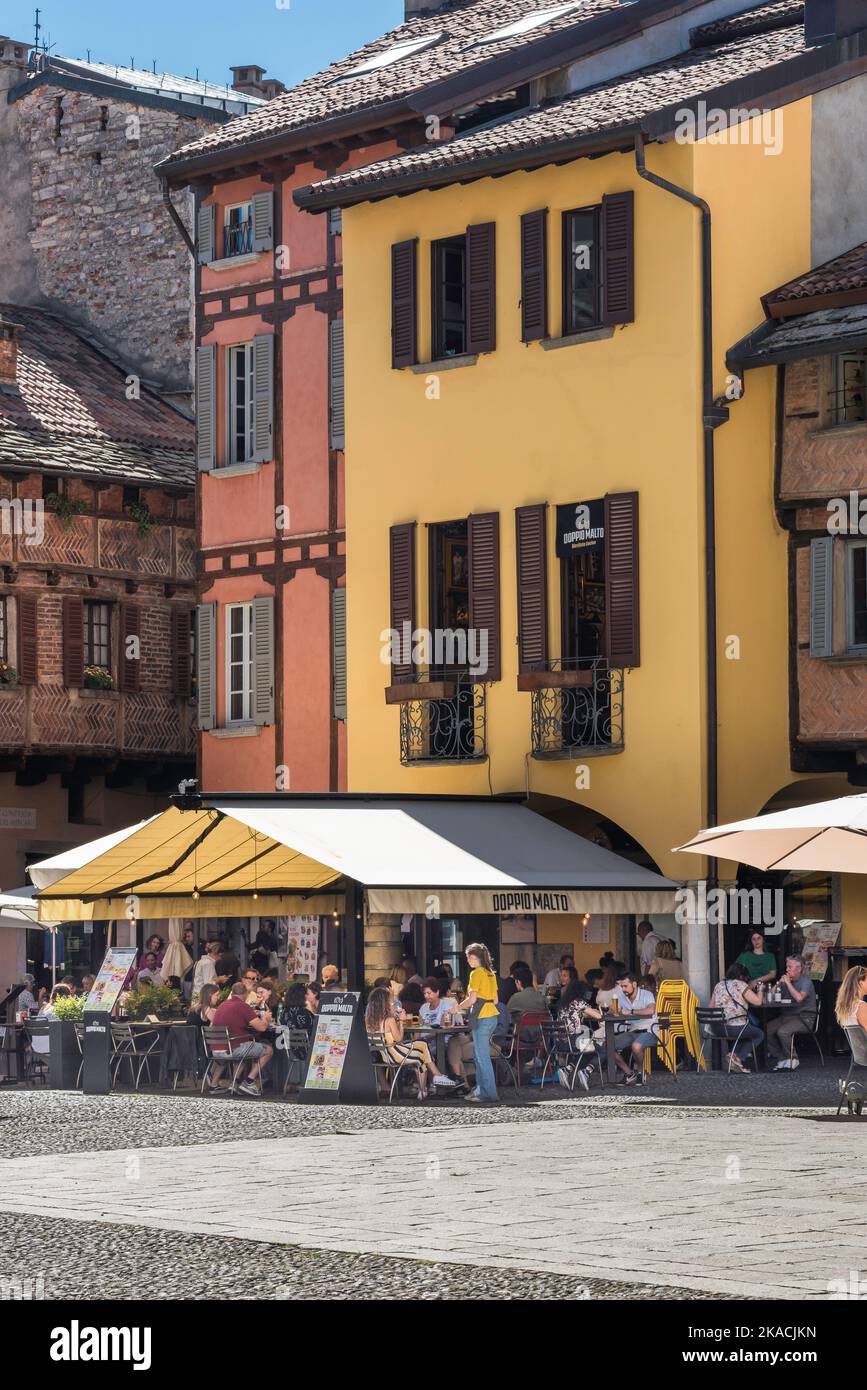 Piazza San Fedele Como, view in summer of people sitting at tables in ...