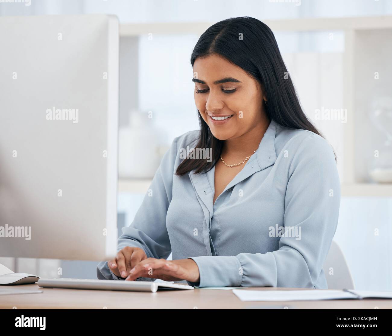 Business woman, computer and office work by happy, smile and relax ...