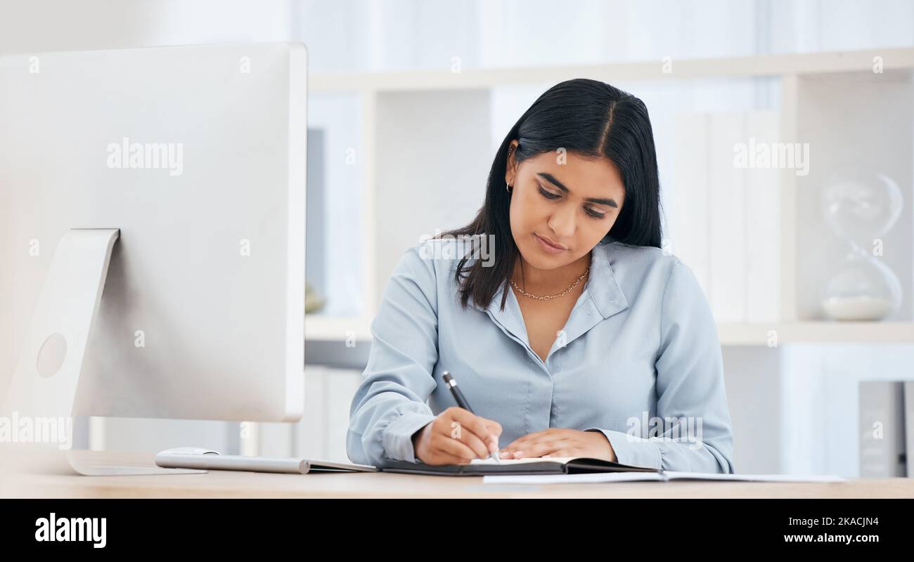 Business woman writing notes, schedule and planning ideas, meeting ...