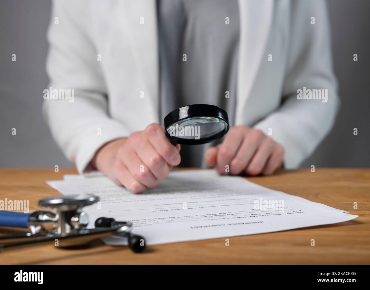DOCTOR SIGNING MEDICAL INSURANCE CONTRACT. Health care documents ...