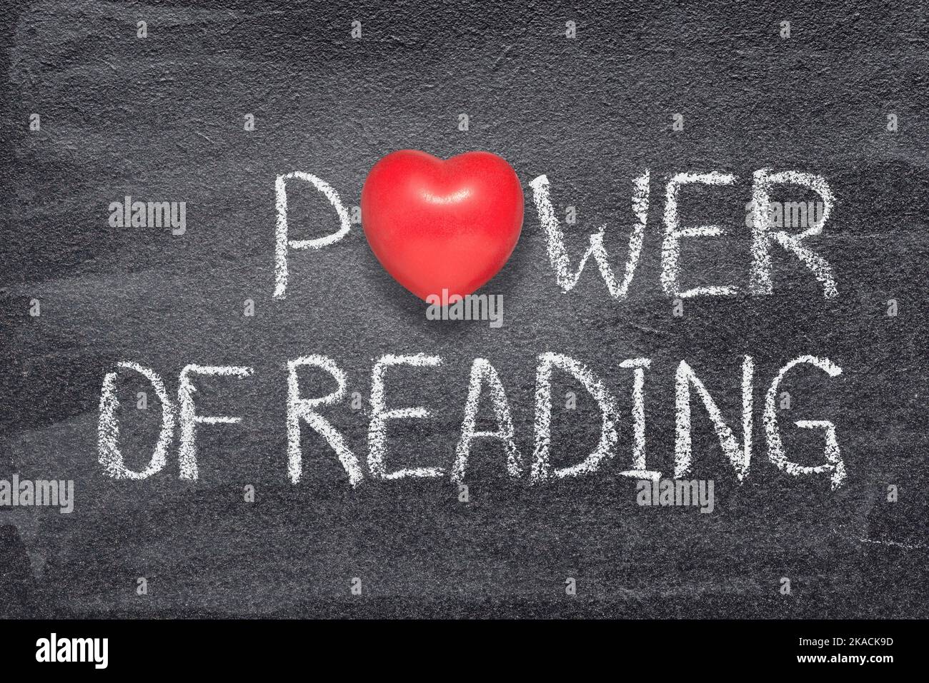 power of reading phrase written on chalkboard with red heart symbol ...