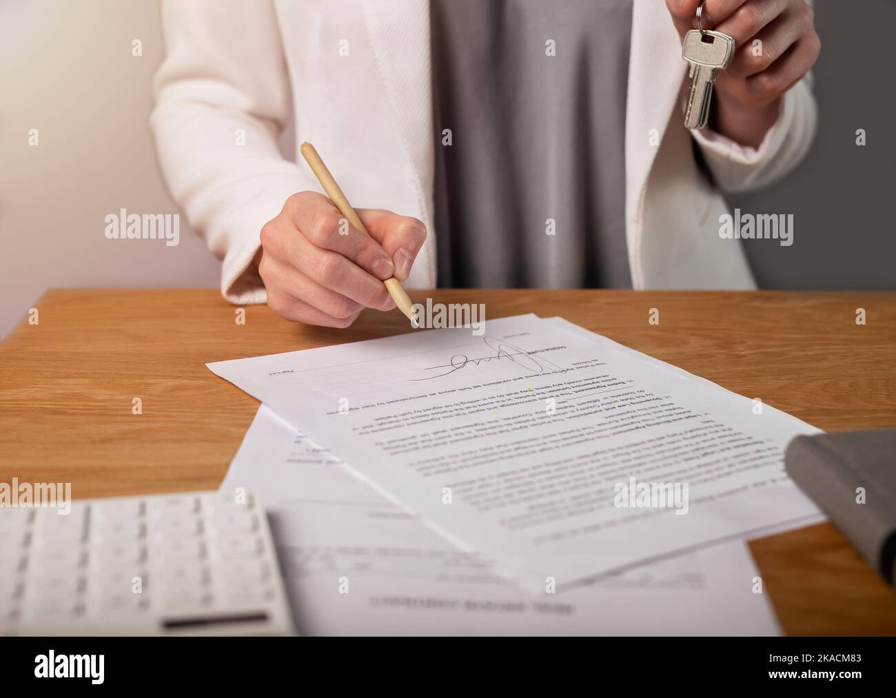 Real estate agent signing contract hi-res stock photography and images ...