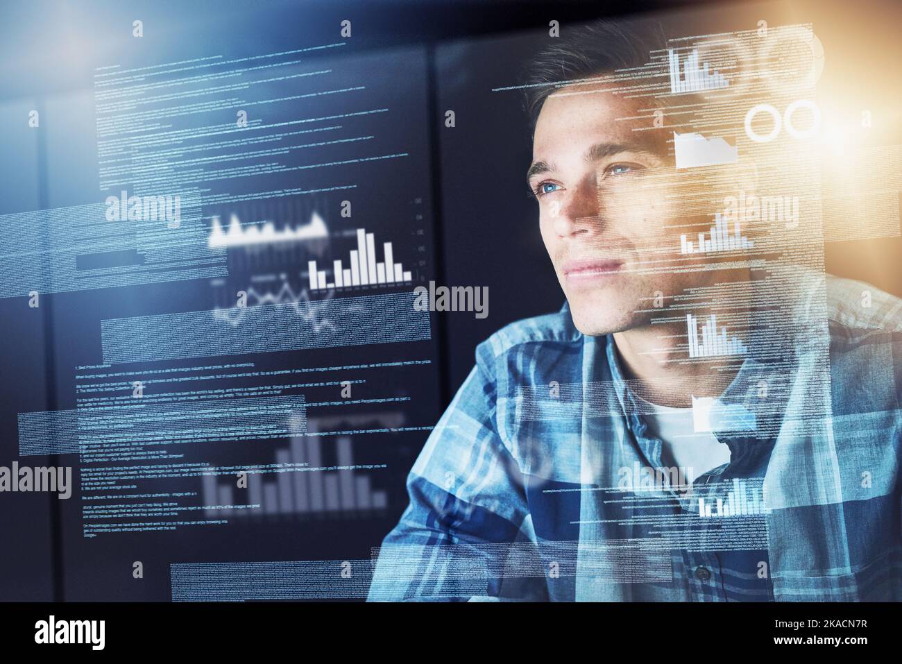 Analyzing the information. a handsome young male programmer at work ... Analyzing the information. a handsome young male programmer at work ...