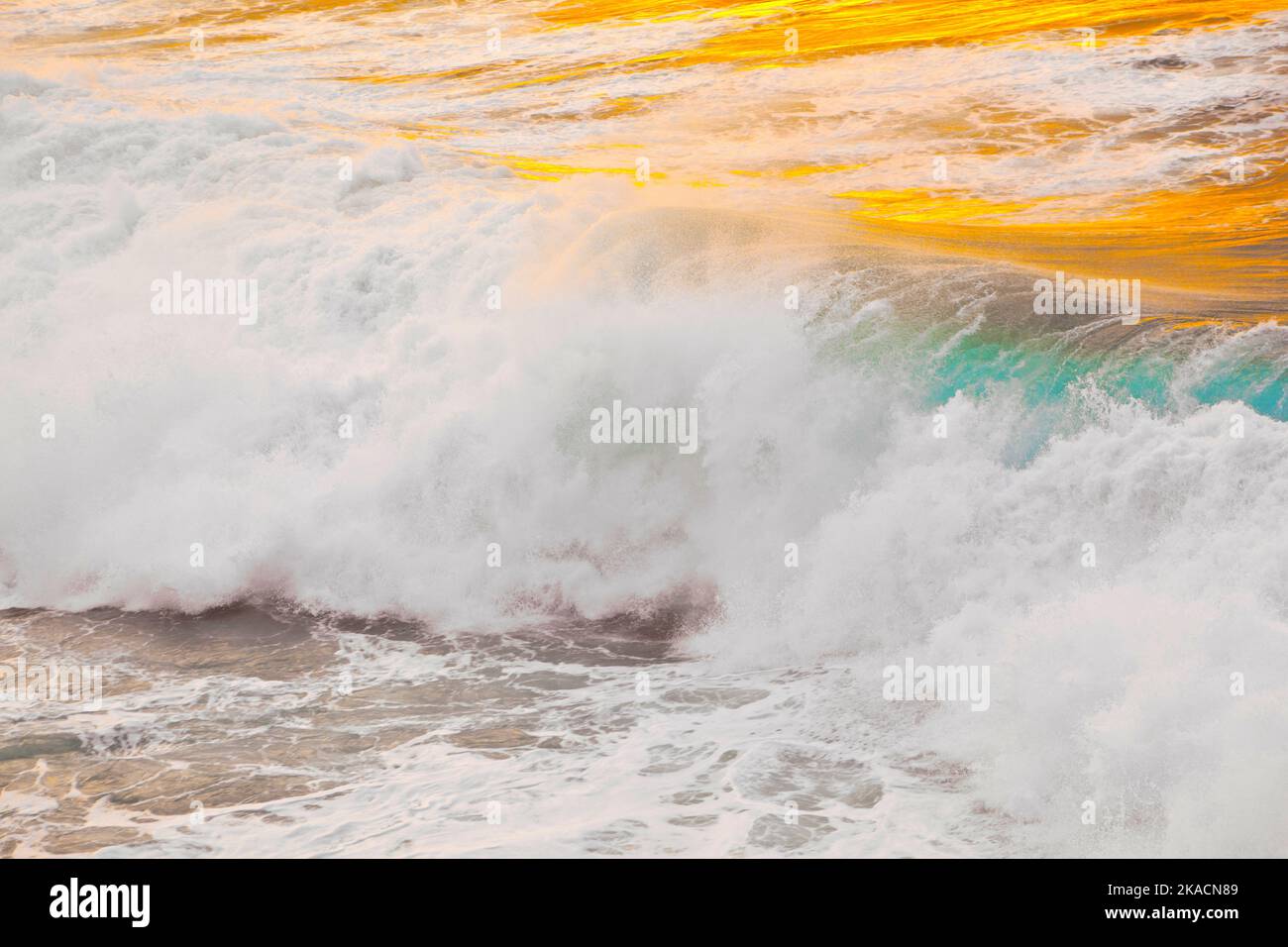 beautiful waves at the beach in sunset Stock Photo - Alamy