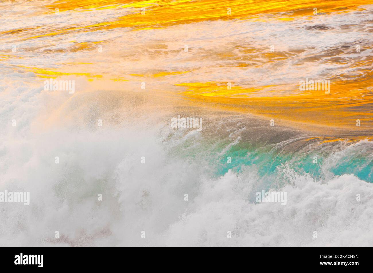 beautiful waves at the beach in sunset Stock Photo - Alamy