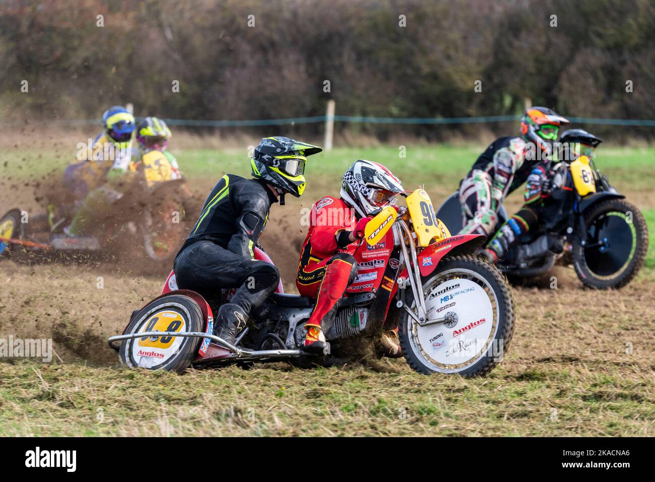 Paul Smith & Toby Vere (98) racing in a grasstrack motorcycle race ...