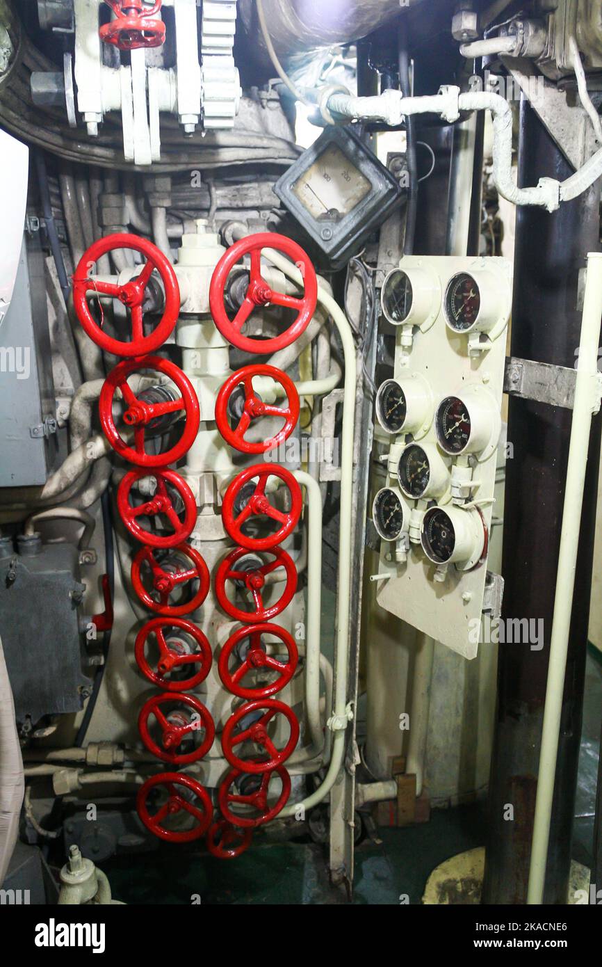 Close up of measurement instruments, valve, lever and pipe line inside ...