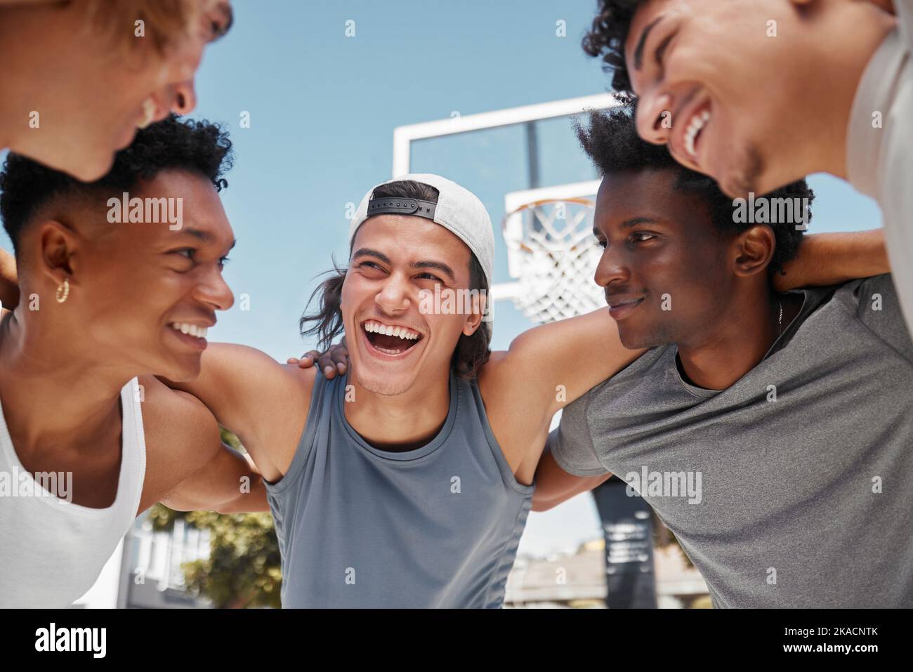 Happy, motivation and team building on a basketball court for a fitness ...