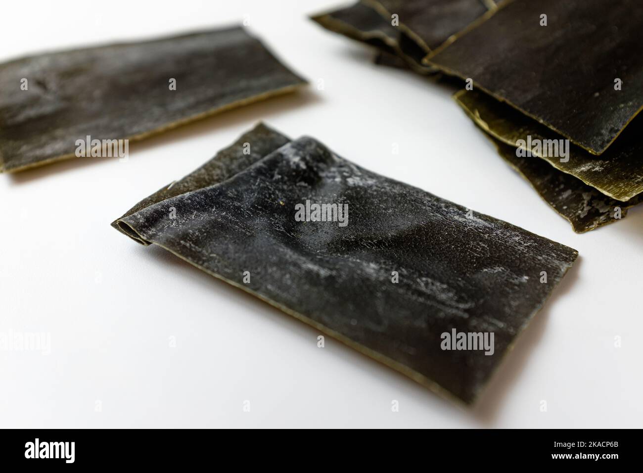 dried kelp on a white background Stock Photo - Alamy