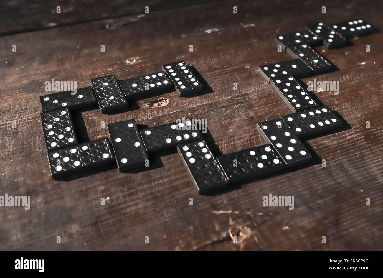 Domino pieces on wood table in order of game. Concept of way Stock ...