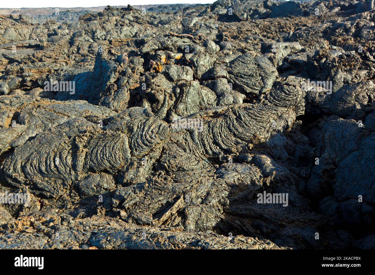 Stones of volcanic flow give a beautiful natural structure Stock Photo ...