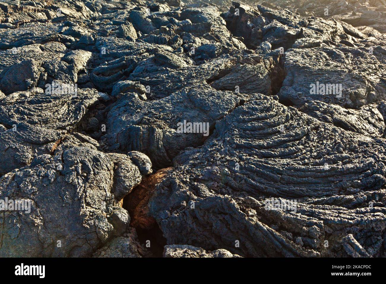 Stones of volcanic flow give a beautiful natural structure Stock Photo ...