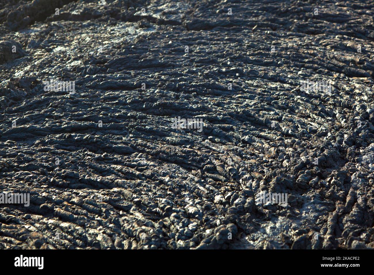 Stones of volcanic flow give a beautiful natural structure Stock Photo ...