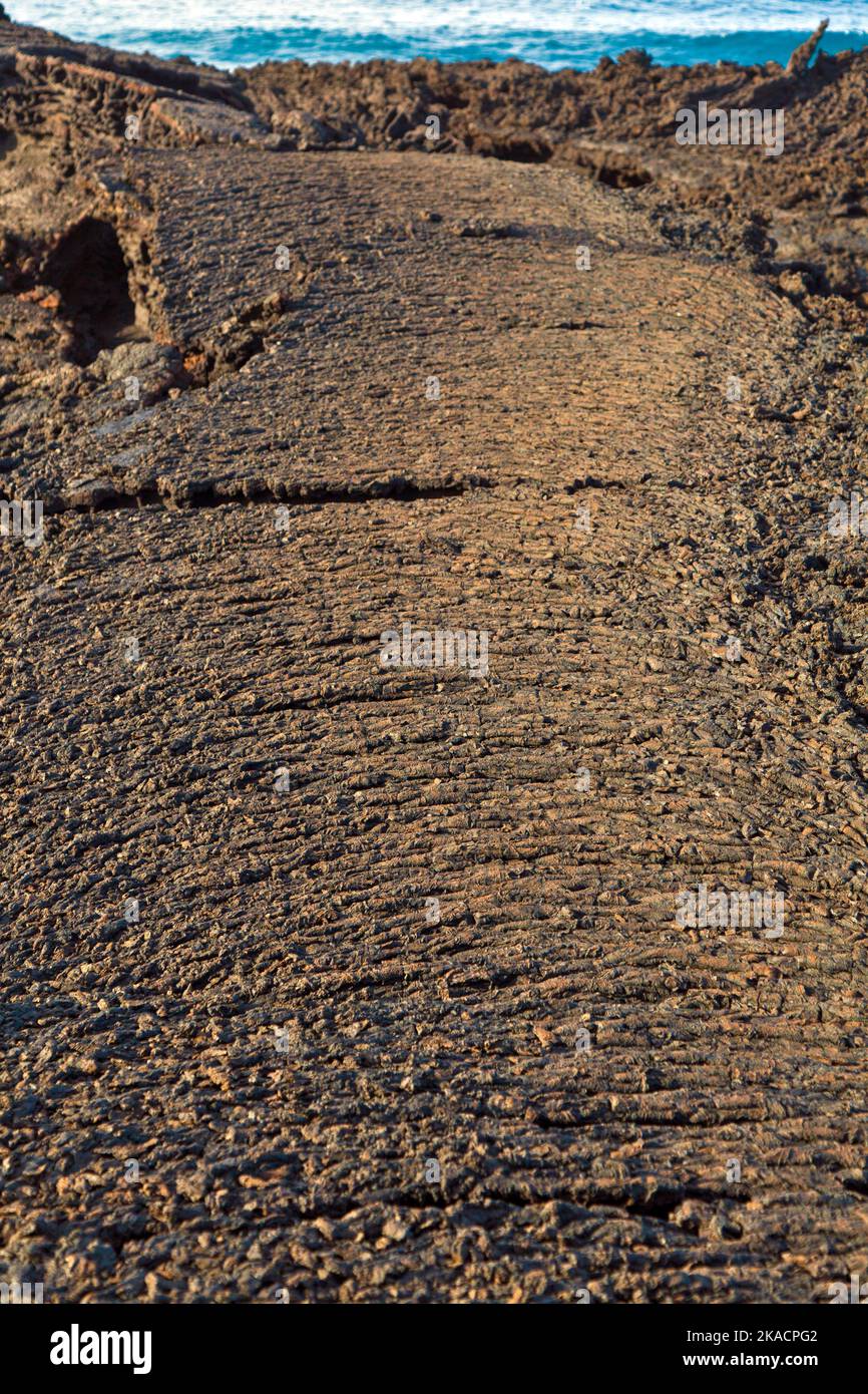 Stones of volcanic flow give a beautiful natural structure Stock Photo ...