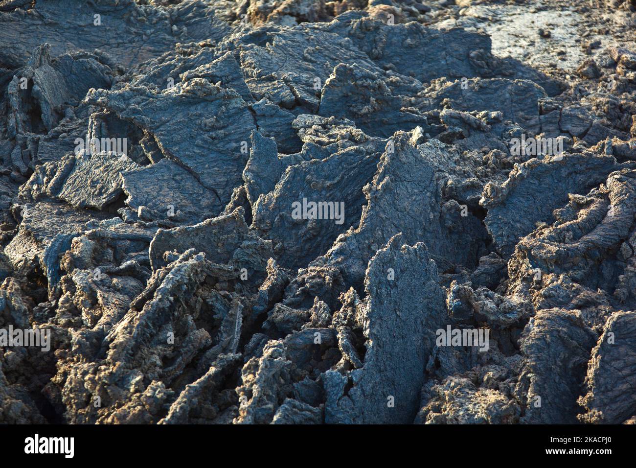 Stones of volcanic flow give a beautiful natural structure Stock Photo ...