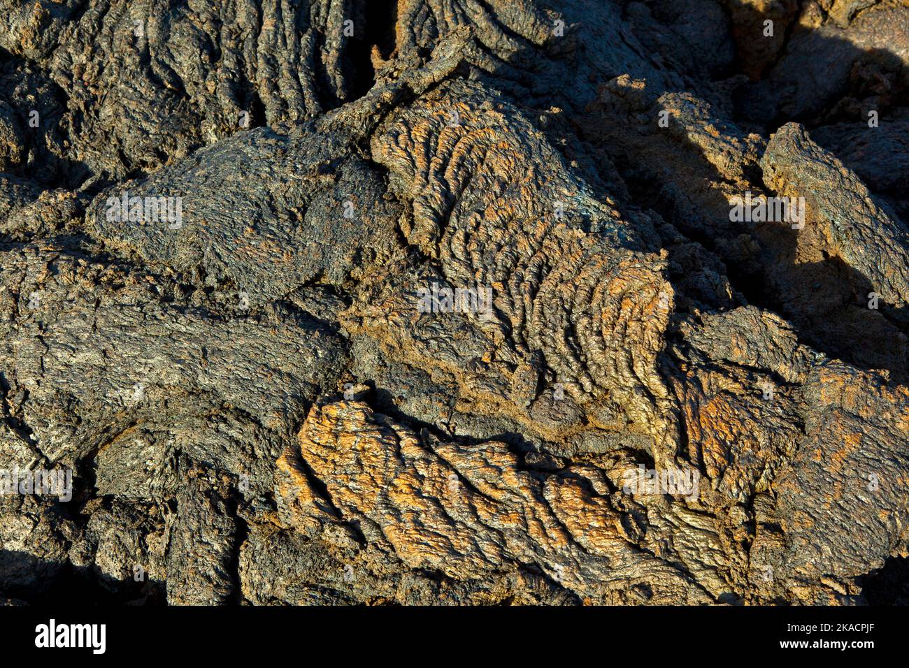 Stones of volcanic flow give a beautiful natural structure Stock Photo ...