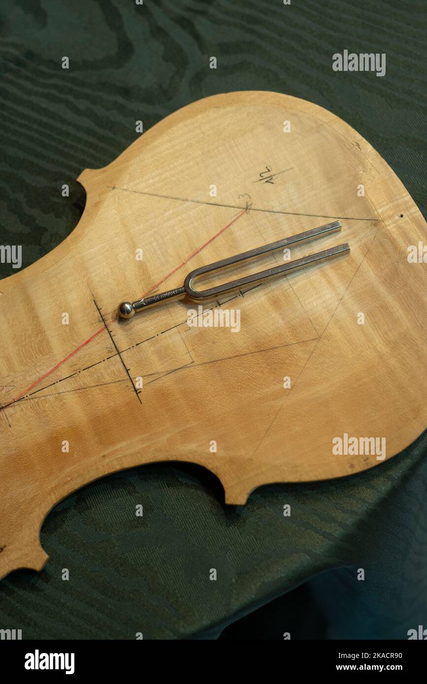 Tuning Fork Lying on Violin Stock Photo - Alamy