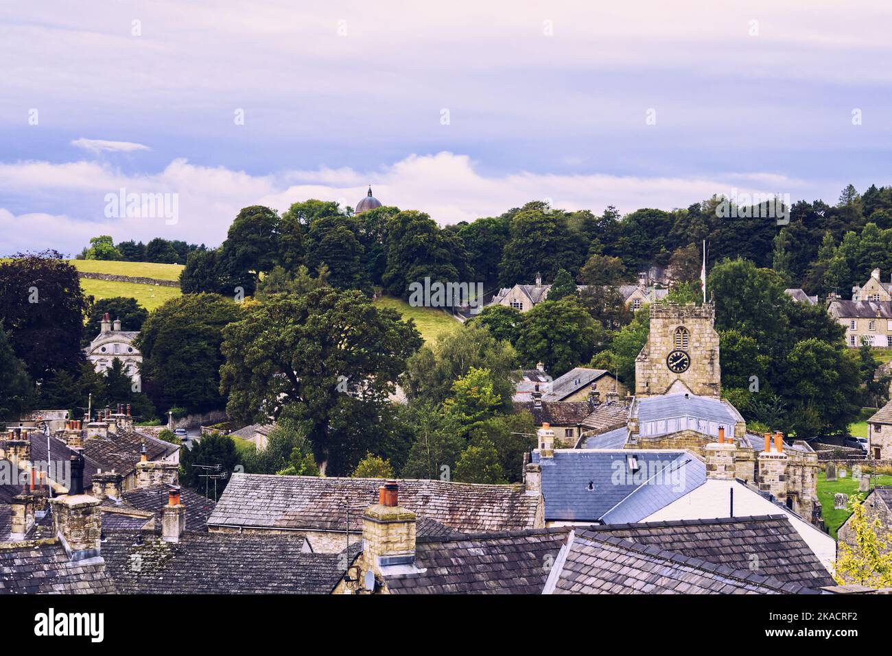 Aerial view of cottages, church and school in the village of ...