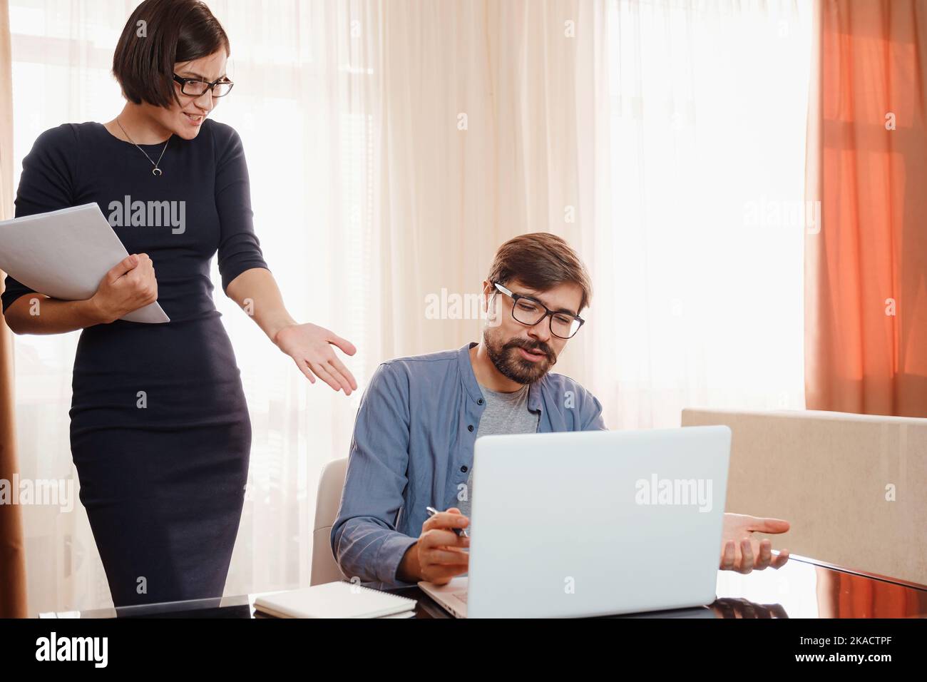 Portrait of attractive mad furious coworkers having fight crisis ...