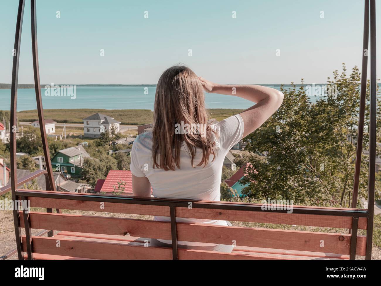 Woman looking into the distance, watching far away, seeing nature, sky ...