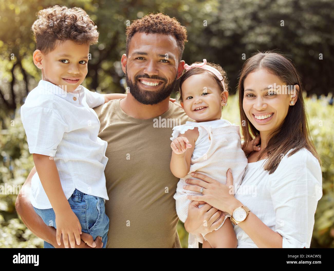 Love, portrait and family at park with happy, smile and relaxed ...