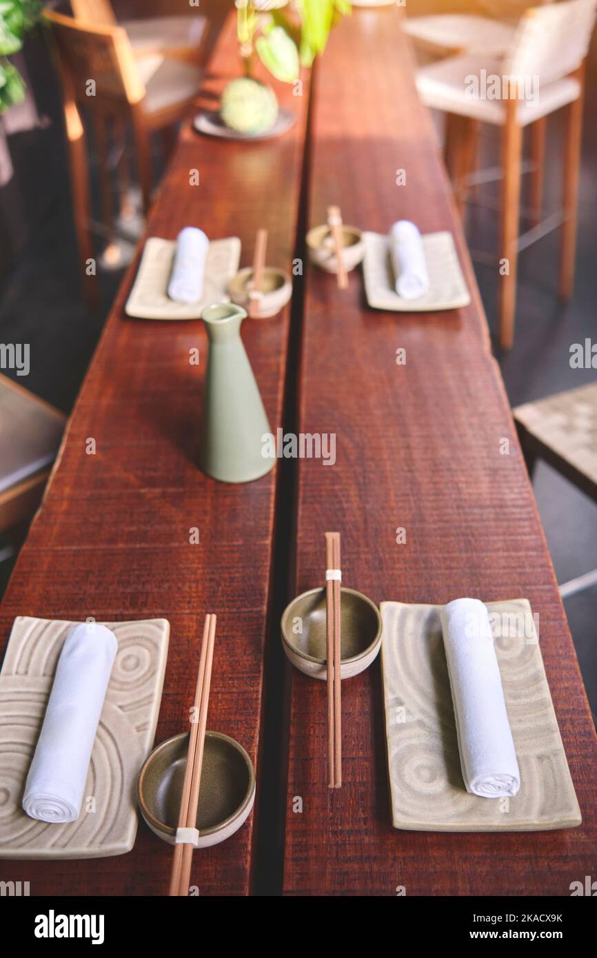 Japanese restaurant in traditional style, Empty plate on mat near ...