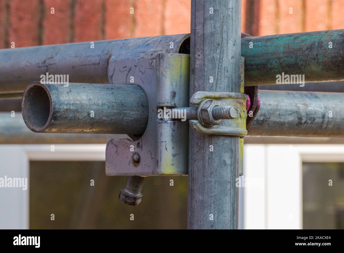 Scaffolding poles on a domestic property Stock Photo - Alamy