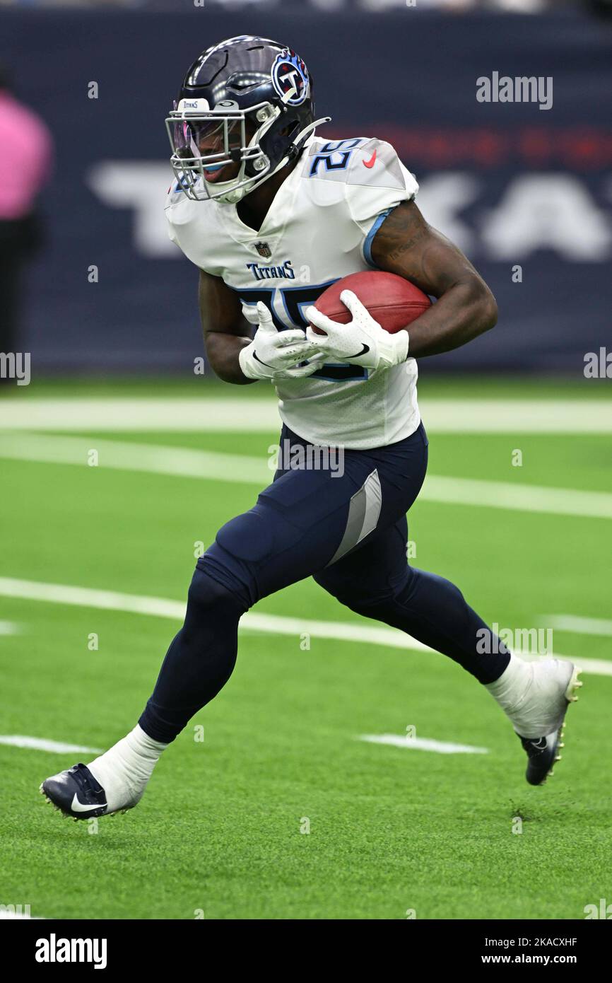 Tennessee Titans running back Hassan Haskins (25) returns a kickoff ...