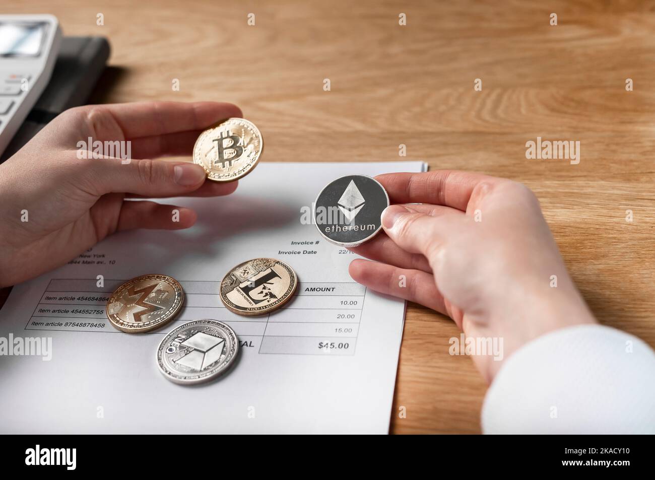 Bitcoin coin and paper invoice document. Payments with crypto currency ...