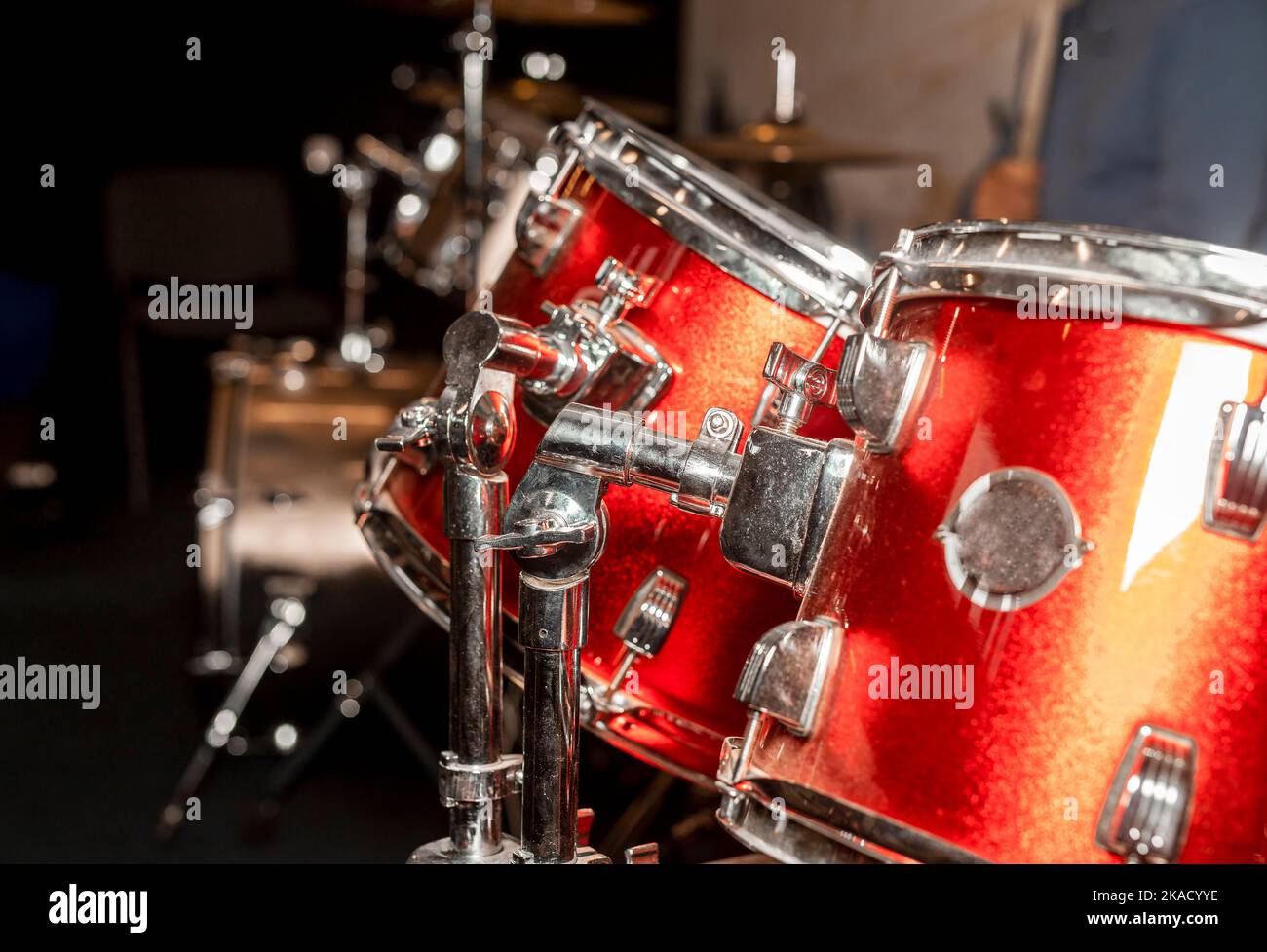 Red and silver drums equipment close up Stock Photo - Alamy