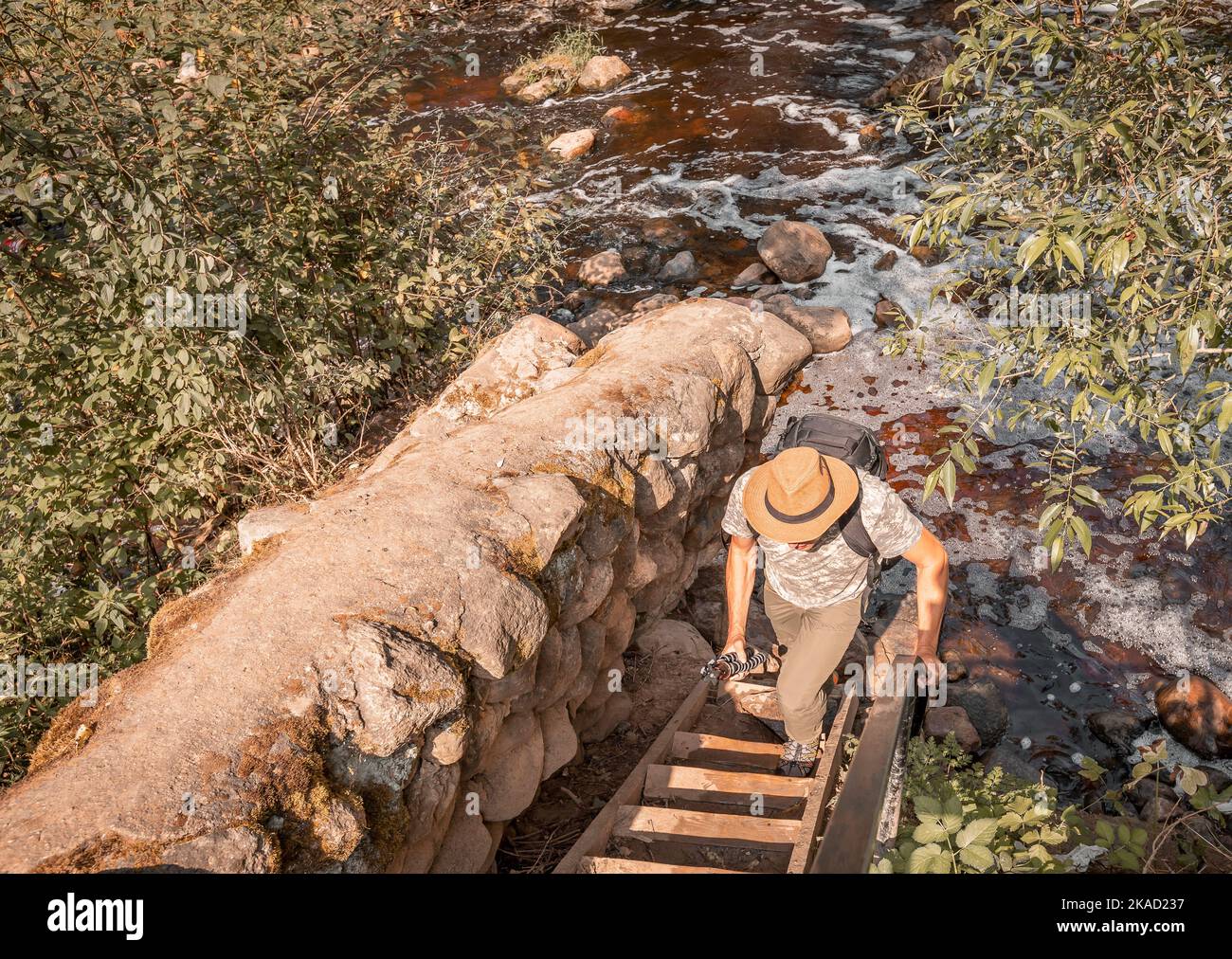 Man backpacker hiking, traveling and exploring summer nature with ...