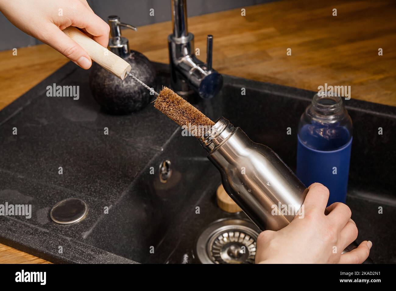 Washing cleaning reusable drinking bottle with coconut fiber bottle ...