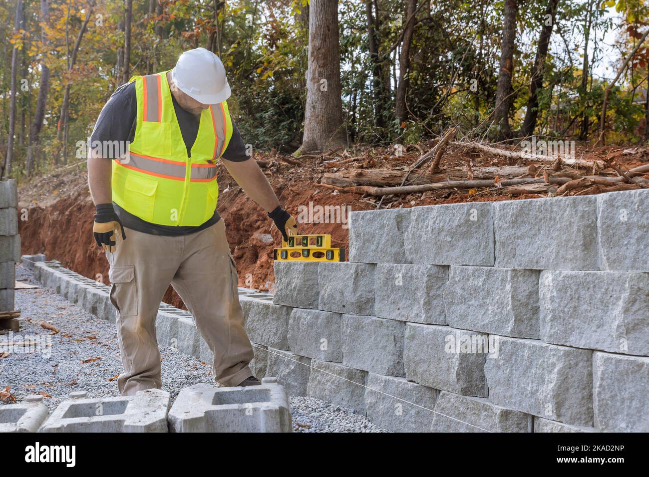 On new property where retaining block wall is being built construction ...