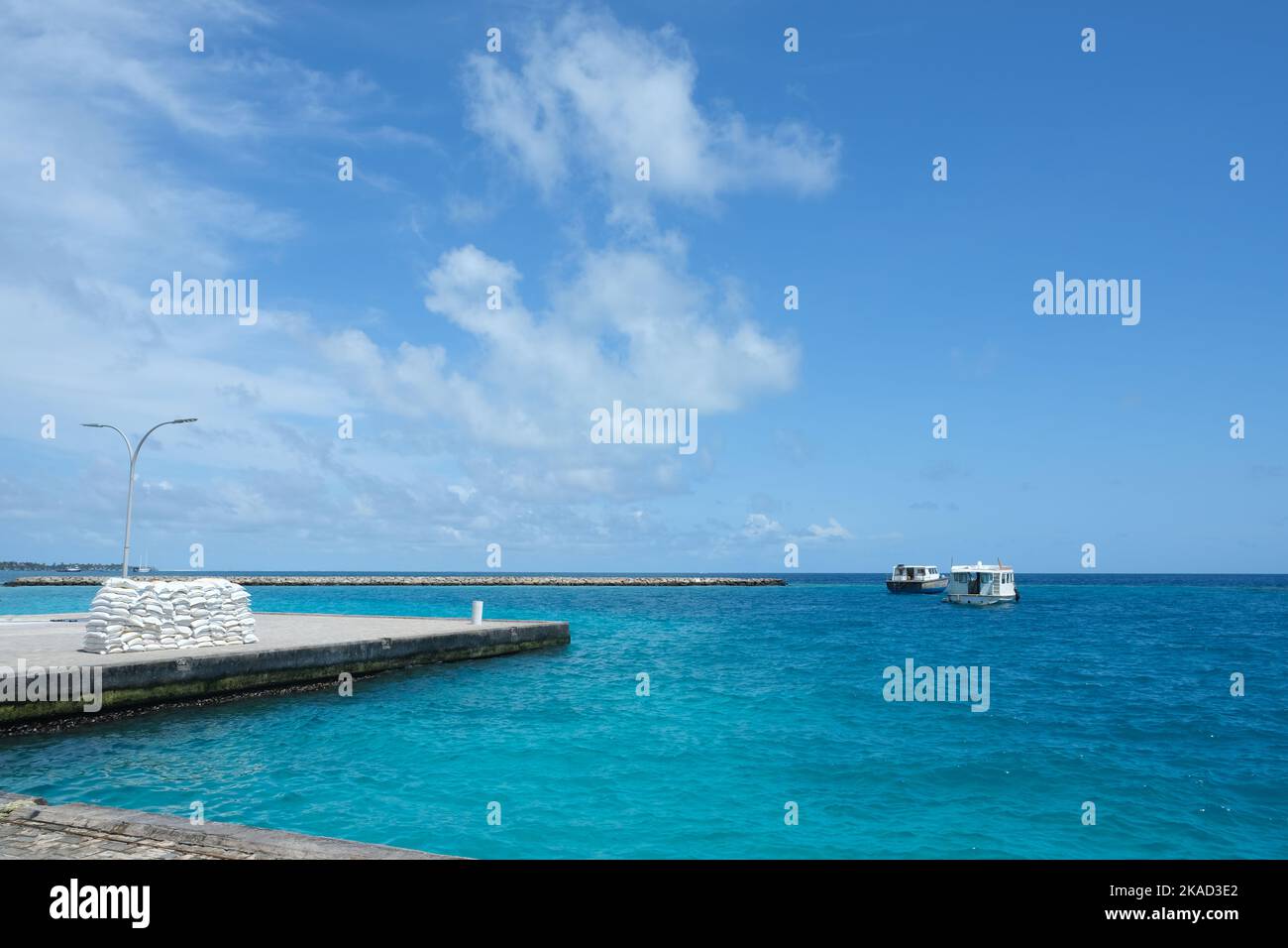 Beautiful afternoon at Rasdhoo harbour. Rasdhoo is an inhabited island ...