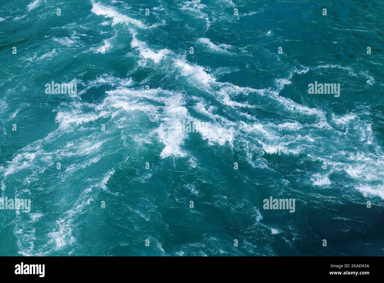Stormy sea water with waves and foam, top view, abstract natural ...