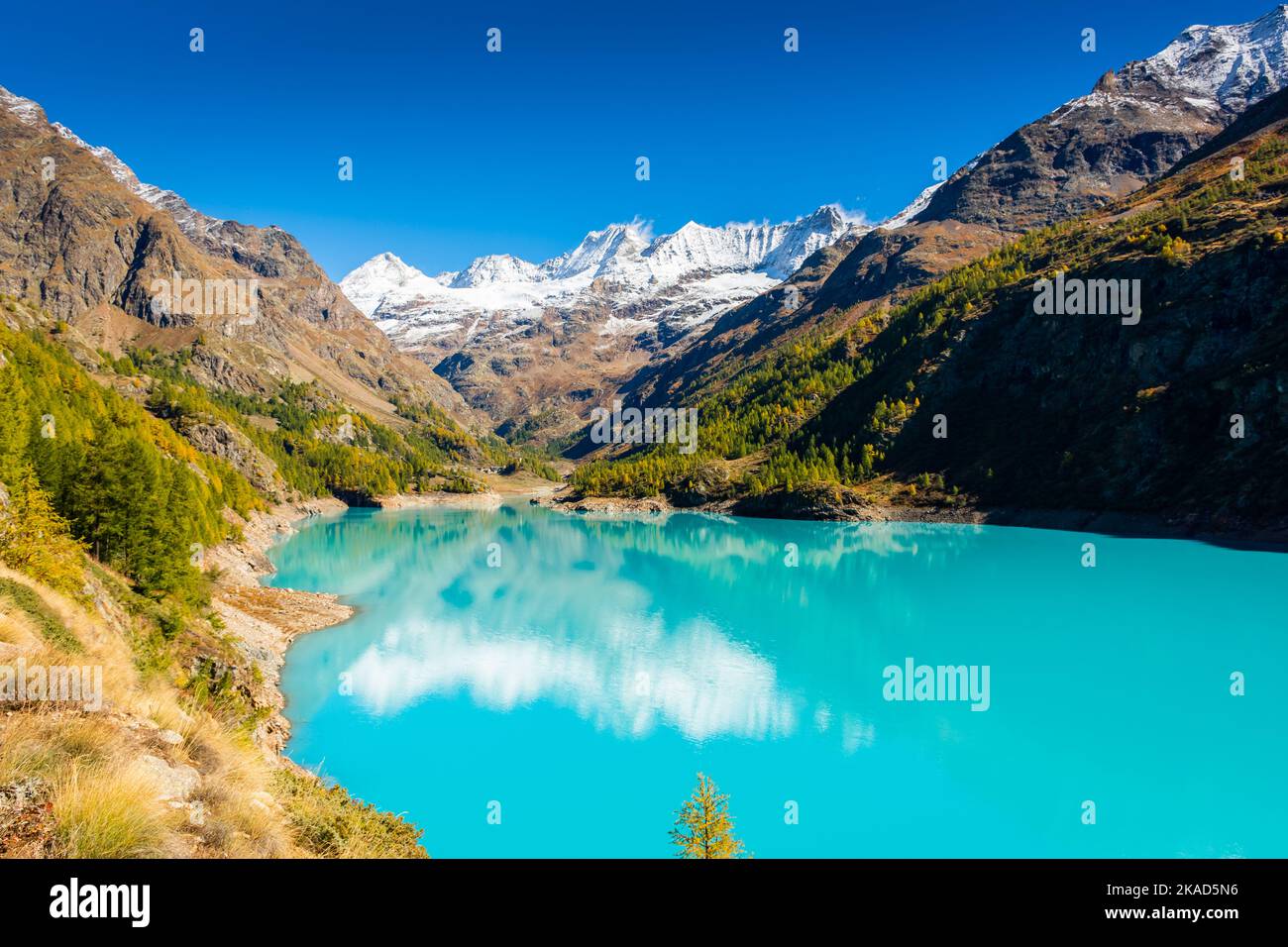 Autumnal landscape of the Lake Place Moulin, an artificial glacial lake ...