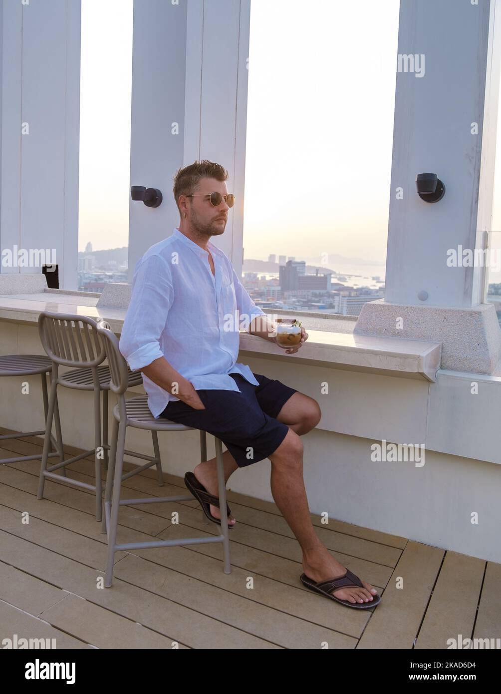 Rooftop bar man hi-res stock photography and images - Alamy