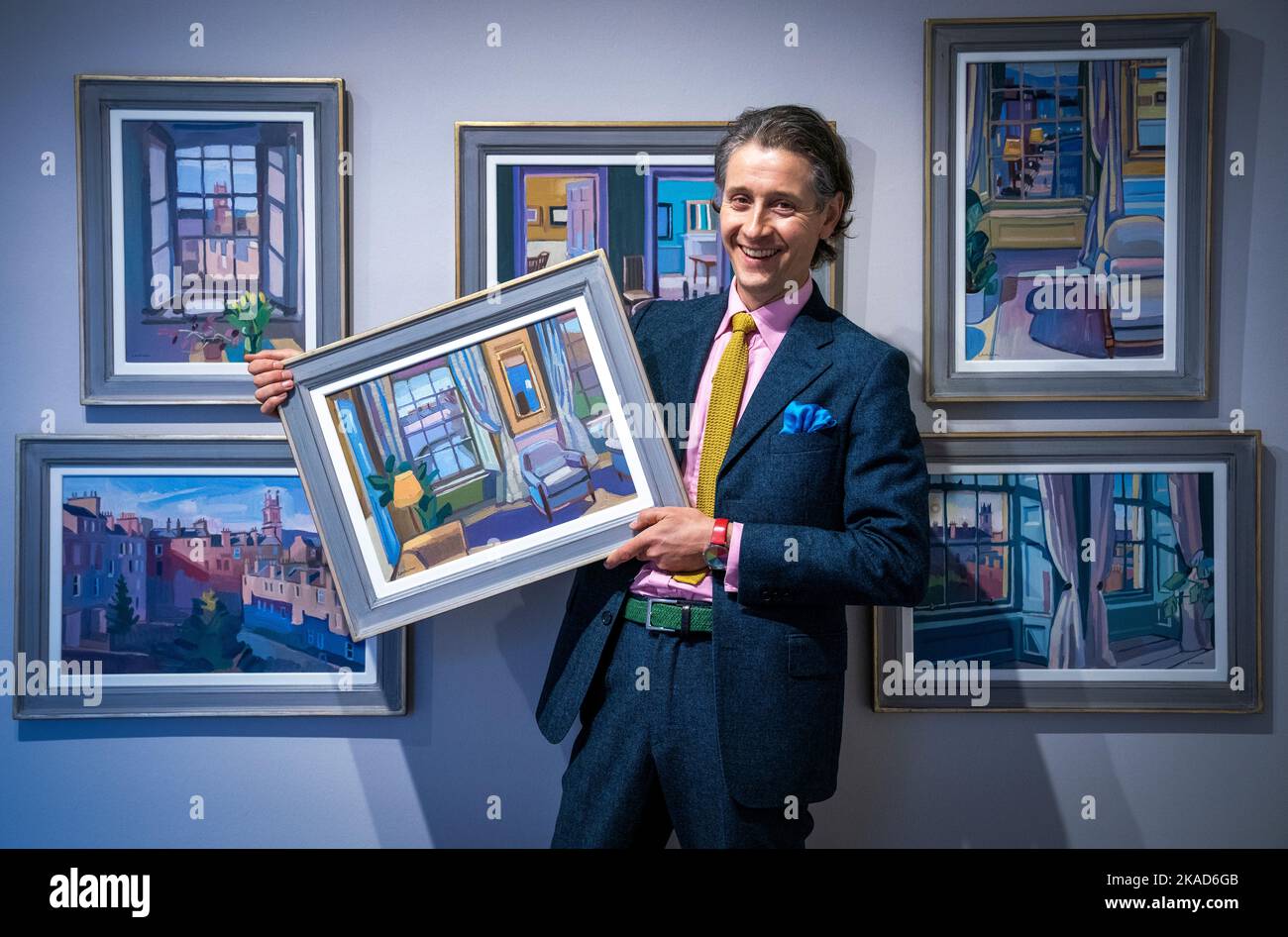 Scottish artist and broadcaster Lachlan Goudie alongside some of his ...