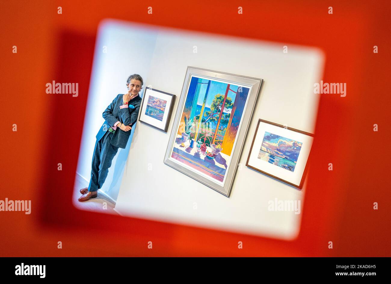 Scottish artist and broadcaster Lachlan Goudie alongside some of his ...