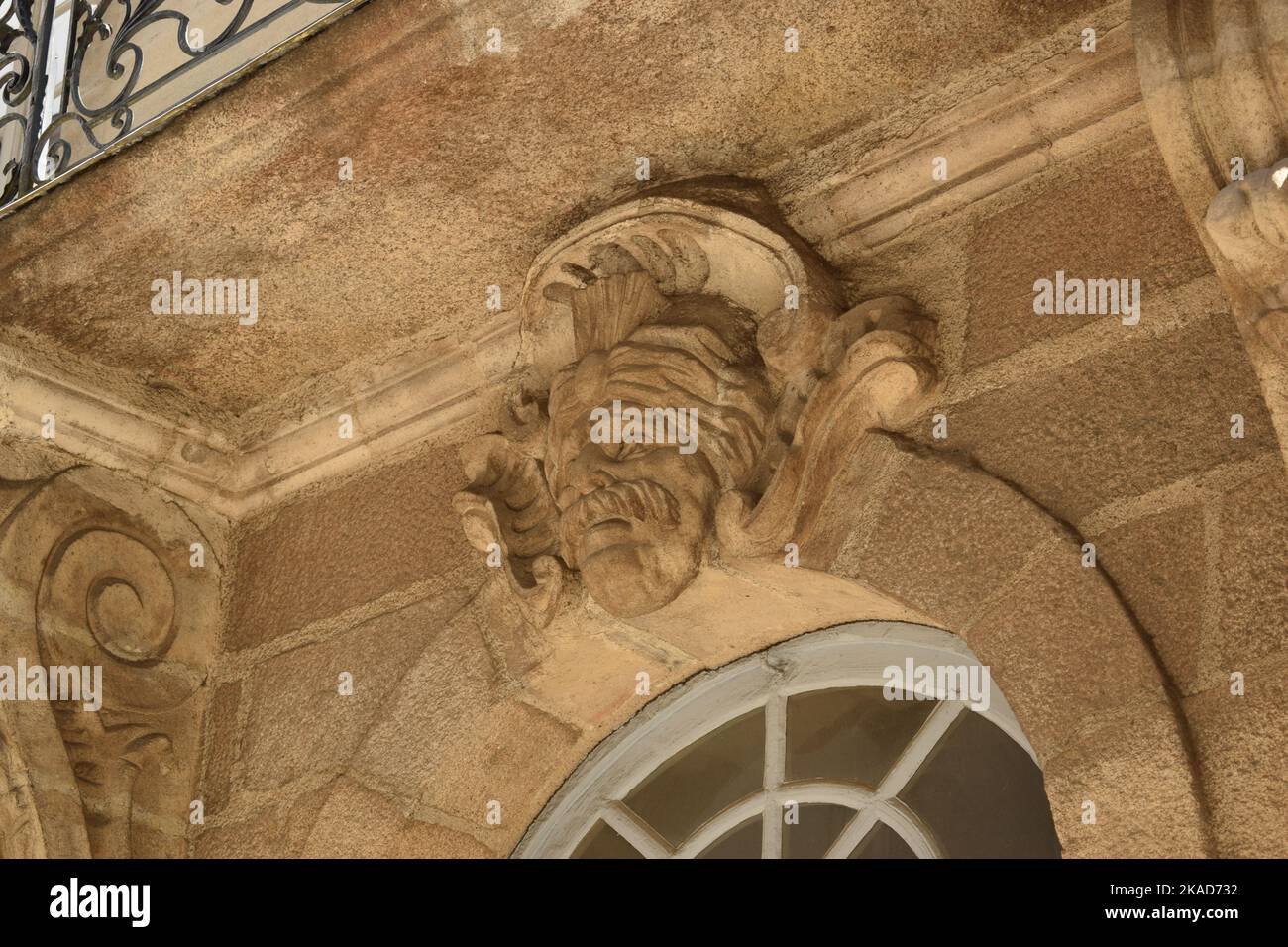 The facade of nan old building with carved walls Stock Photo - Alamy