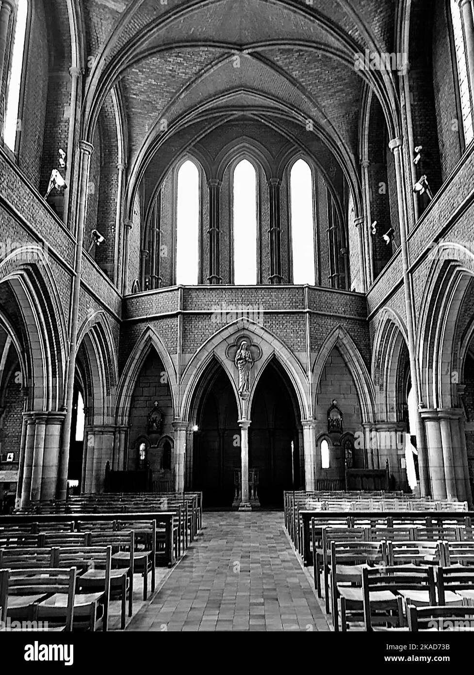 A grayscale of the church interior with beautiful architectural details ...