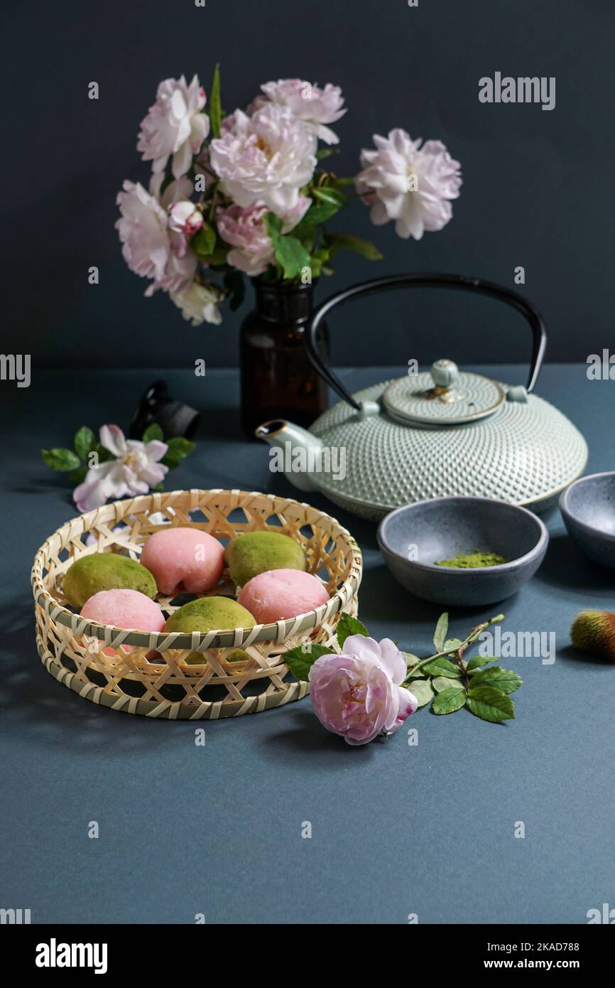 Japanese dessert mochi with matcha green tea powder and cherry ...