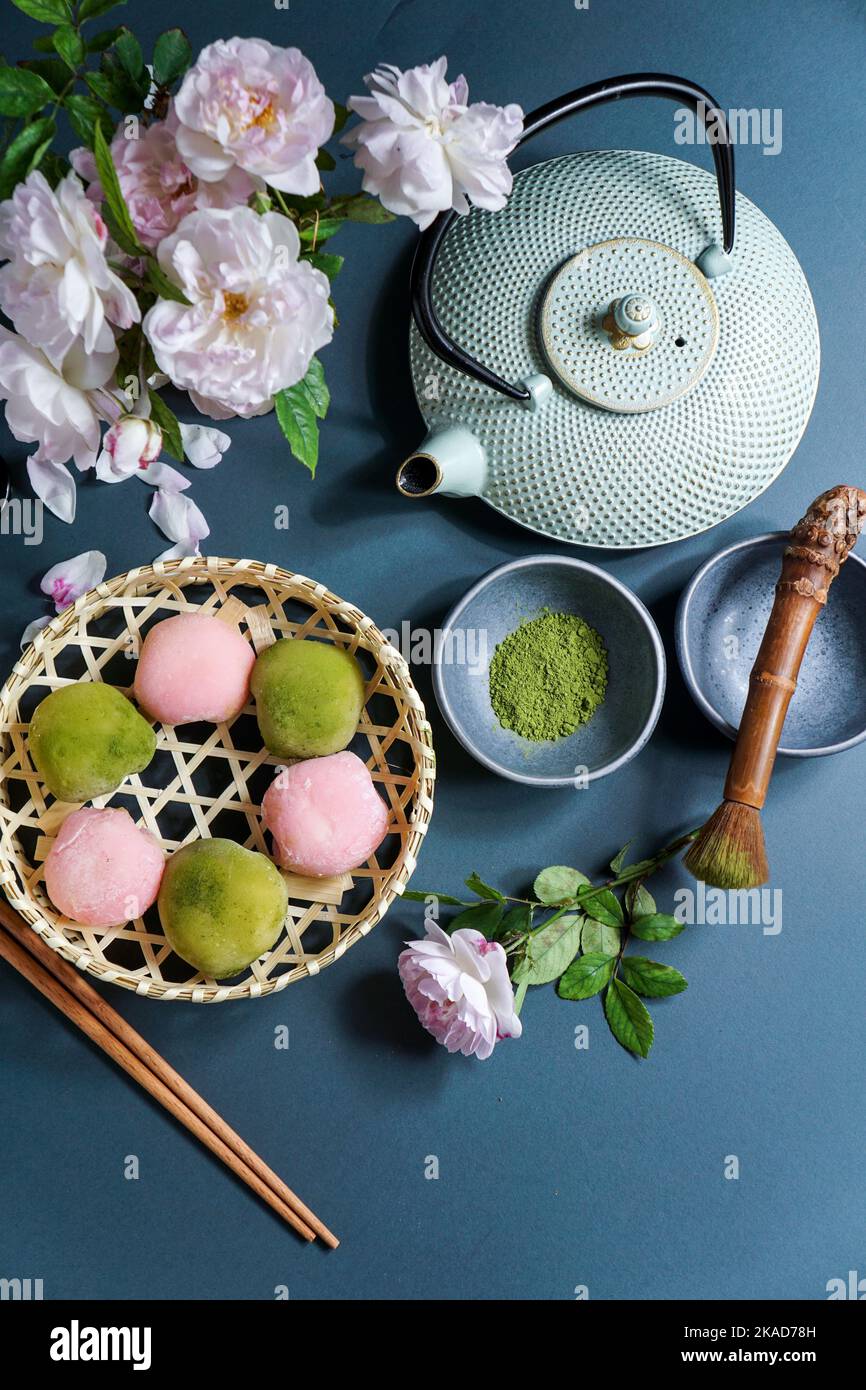 Japanese dessert mochi with matcha green tea powder and cherry ...